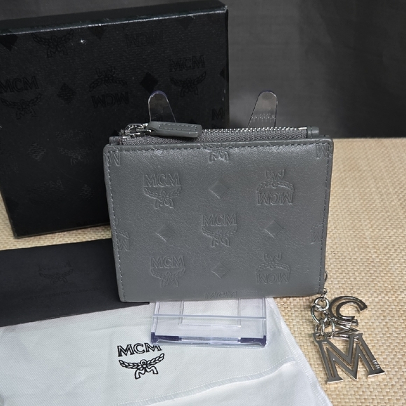 MCM | Bags | Mcm Gray Leather Wallet With Logo Charm | Poshmark